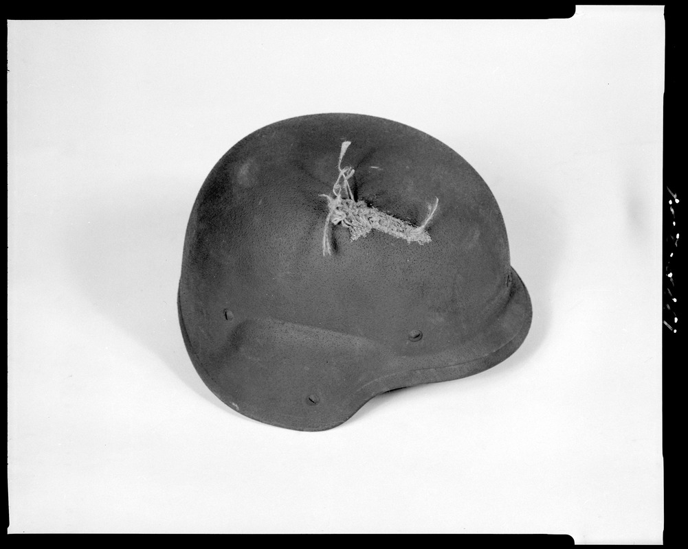 IPL, damaaged helmet - Digital Commonwealth