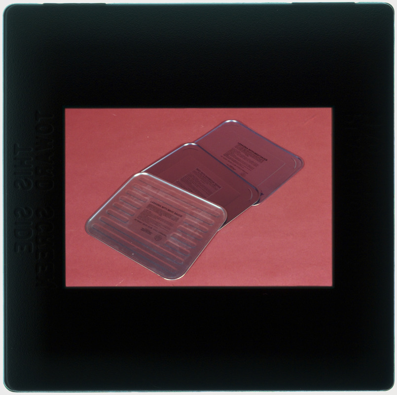 FED, lids with different style lettering - Digital Commonwealth