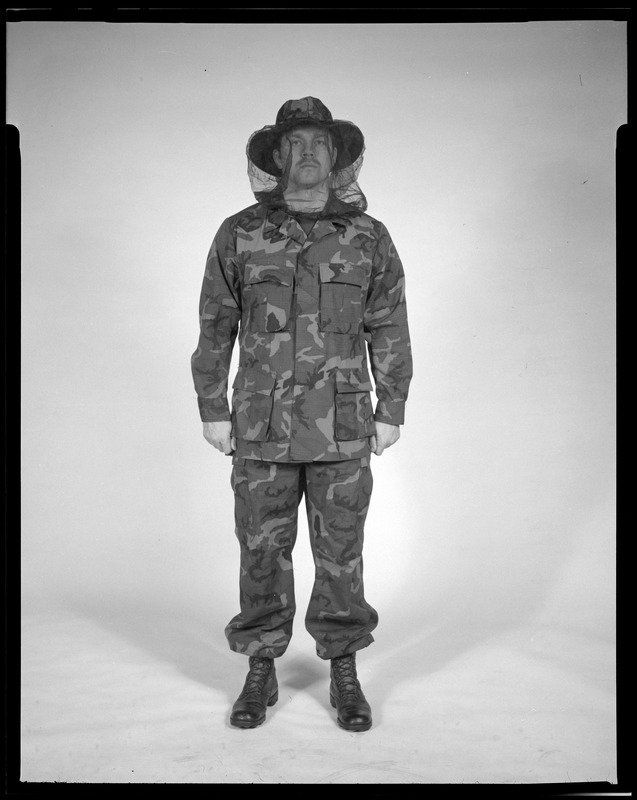 Camouflage uniform and hat with insect net - Digital Commonwealth