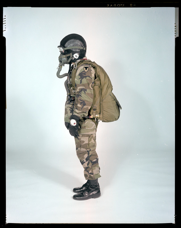 AMEL basic military free fall parachute system on jumper, side view ...