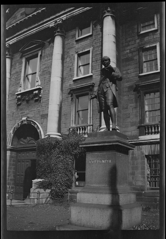 Statue of Oliver Goldsmith in front of Trinity College, Dublin, Ireland ...