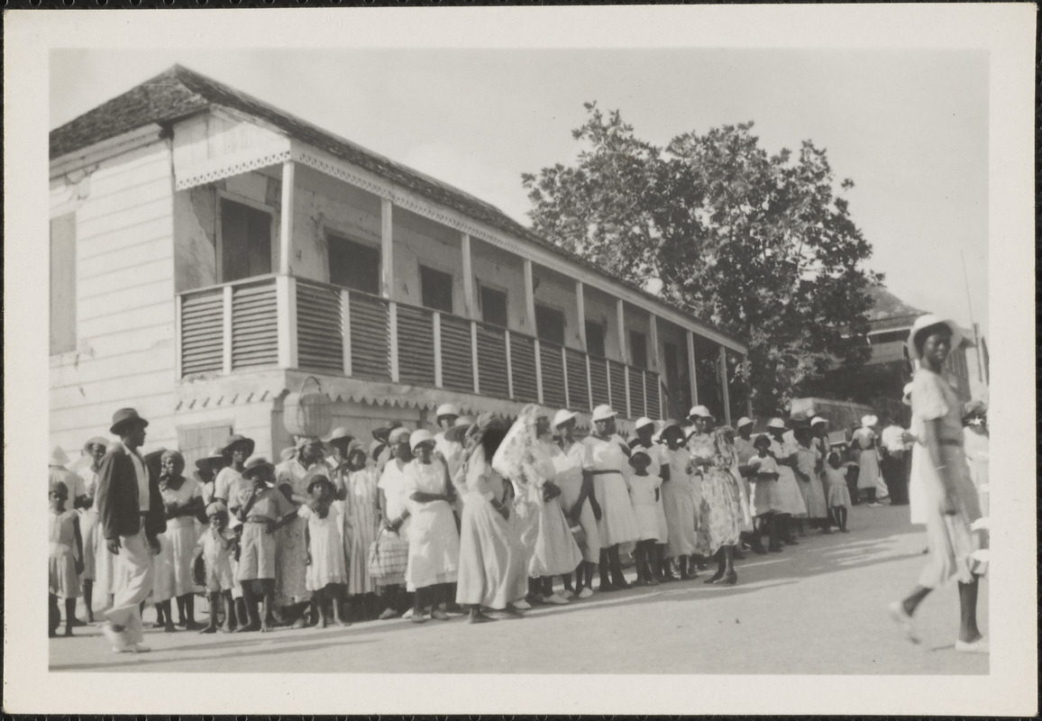 Montserrat, B. W. I., natives on the wharf awaiting the tourists ...