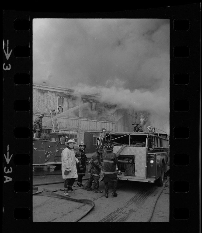 Firemen battling fire on Clinton Street, Boston - Digital Commonwealth