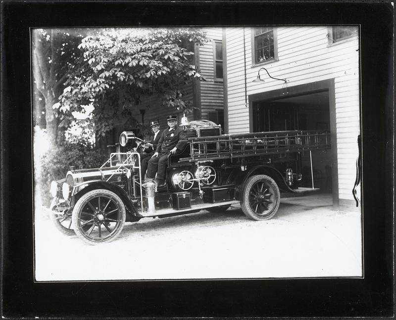 Fire engine with two firemen - Digital Commonwealth