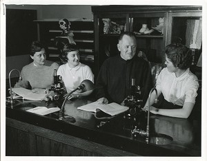 Michael P. Walsh with students in lab - Digital Commonwealth