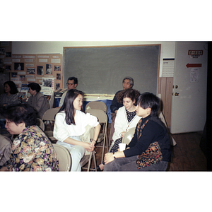 Several women sit talking at an Association event - Digital Commonwealth