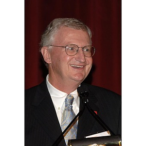 Outstanding Alumni Award recipient Joseph Fleming speaks at the Alumni ...