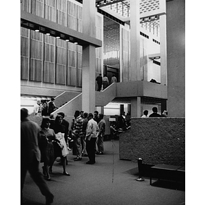 People mill around during the Ell Student Center addition opening ...