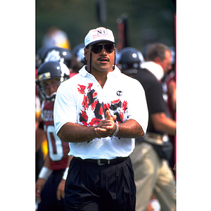 Football coach during a team practice - Digital Commonwealth