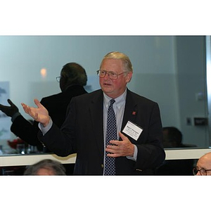 Neal Finnegan gestures while speaking at the Veterans Memorial dinner ...