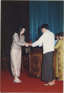 A photograph of Sandy Hia during a rehearsal graduation ceremony in ...