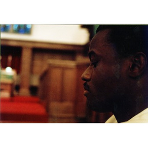 Profile of a man's face, a member of the Boston Gay Men's Chorus ...