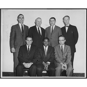Group of seven men pose together - Digital Commonwealth