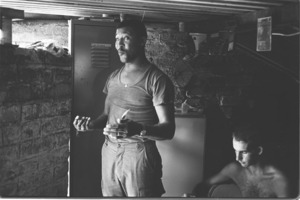 Staff Sergeant James E. Downing, standing, Lt. Peter Urso, sitting; Gia ...