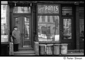 Older man standing in the shabby store front of Joseph Pants, Custom ...