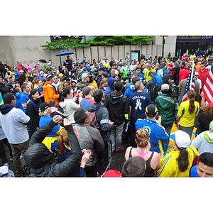 Large crowd stands at One Run finish line - Digital Commonwealth