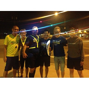 Runners from Leg 8 and 9 of the One Run relay pose for a photo ...