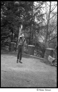 Peter Simon shooting a basketball - Digital Commonwealth