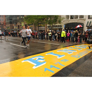 Runners crossing finish line at "One Run" event in Boston (May 2013 ...