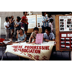 Two men and a woman representing the Chinese Progressive Association ...