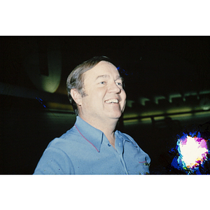 Man in blue shirt smiling - Digital Commonwealth