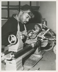 Man in machine shop - Digital Commonwealth