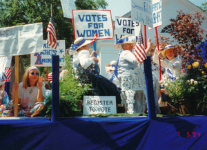 Parade float, women's suffrage section - Digital Commonwealth