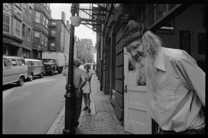 Prescott Townsend exiting a building on Beacon Hill - Digital Commonwealth