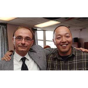Two men pose together at the International Student and Scholar ...