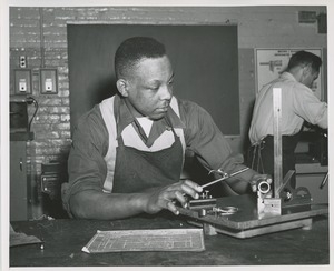 Man in machine shop - Digital Commonwealth