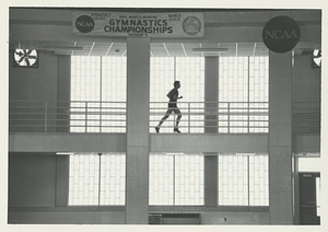 Man on running track around Blake Arena - Digital Commonwealth