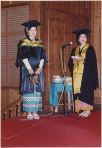 A photograph of Sandy Hia with Daw Sein Myint during her graduation ceremony at Dagon University ...