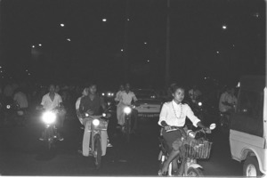 Saigon night scene: Vietnamese "cowboys" on Honda. - Digital Commonwealth
