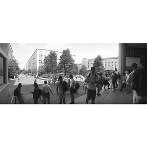 Students walking in Snell Library quadrangle - Digital Commonwealth