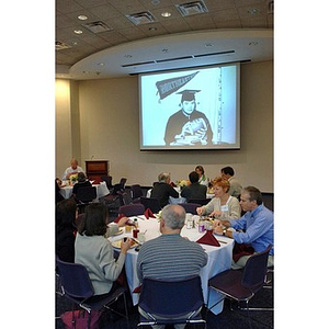 Guests eating and conversing at the Alumni Legacy Breakfast - Digital ...