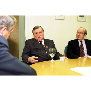 Lech Walesa sits next to Dean Lowndes at the inauguration of the ...