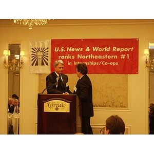 Bruce Nelson, left, shaking hands with College of Business ...