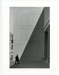 O'Neill Library exterior: main entrance with student walking in ...