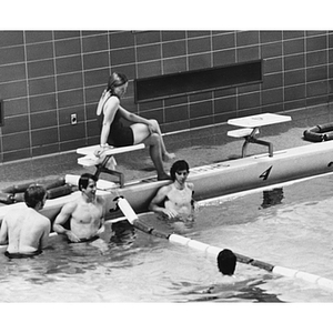 Five students at the pool in Barletta Natatorium - Digital Commonwealth