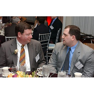 Joe Halpern and another man converse at The National Council Dinner ...
