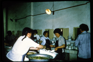 Judy's slides [Judy Weinstein?]: food preparation in a large kitchen ...