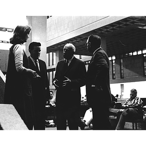 Charles Devlin taking Carl Ell on a tour of the Ell Student Center ...