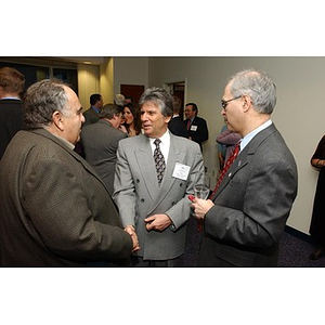Ira Weiss speaks with two men at The National Council Dinner - Digital ...