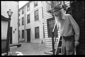 Prescott Townsend in a court yard on Beacon Hill - Digital Commonwealth