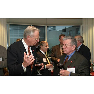 Major General Leo Childs converses with a man at the Veterans Memorial ...