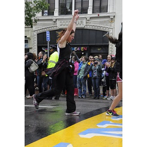 A "One Run" participant approaches the Copley Square finish line ...
