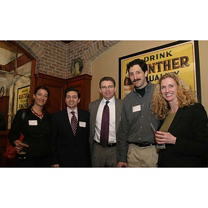 Five people pose together at the Northeastern University New York City ...
