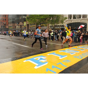 Runners crossing finish line at "One Run" event in Boston (May 2013 ...