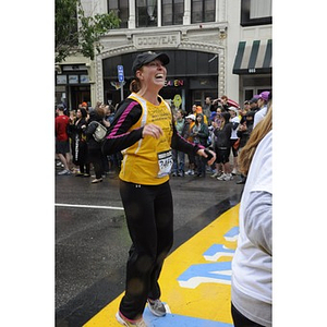 A "One Run" participant touches the Copley Square finish line - Digital ...